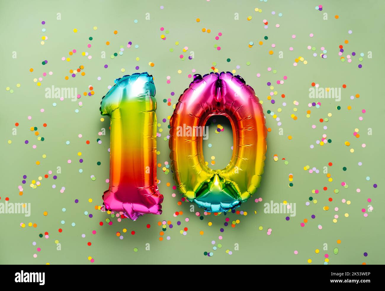 Colorful balloon number 10 on light green background. New Year of ...