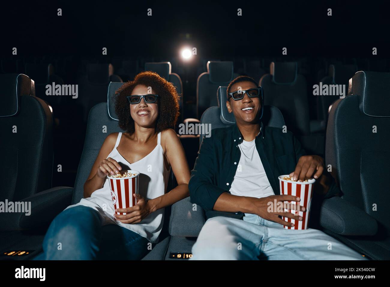 Couple seat cinema hi-res stock photography and images - Alamy