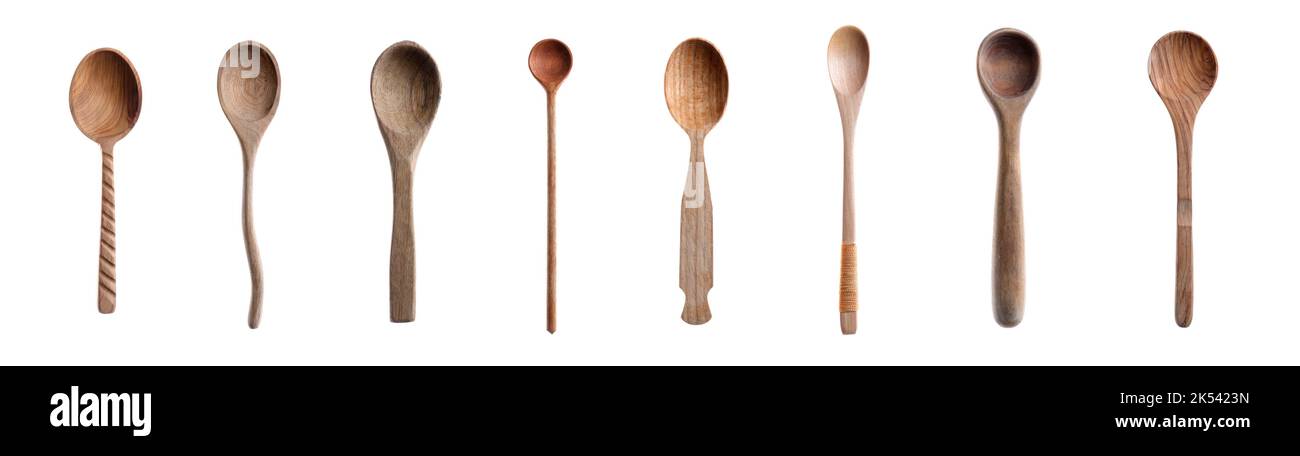 Set of wooden spoons on white background Stock Photo - Alamy