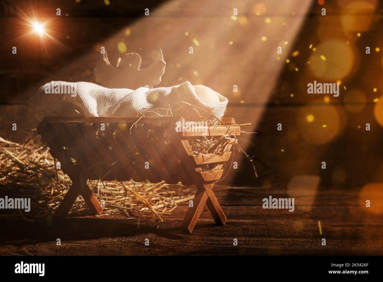Manger with baby and angel in barn. Concept of Christmas story Stock ...