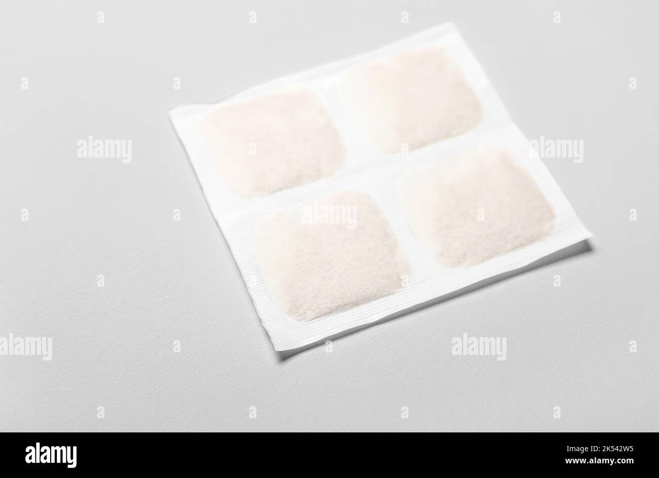 Mustard plaster on grey background Stock Photo - Alamy