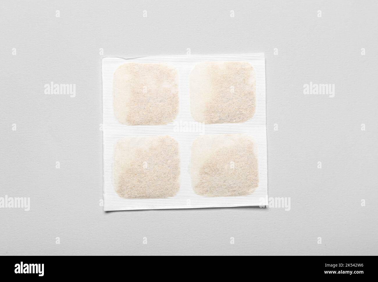 Mustard plaster on grey background Stock Photo - Alamy