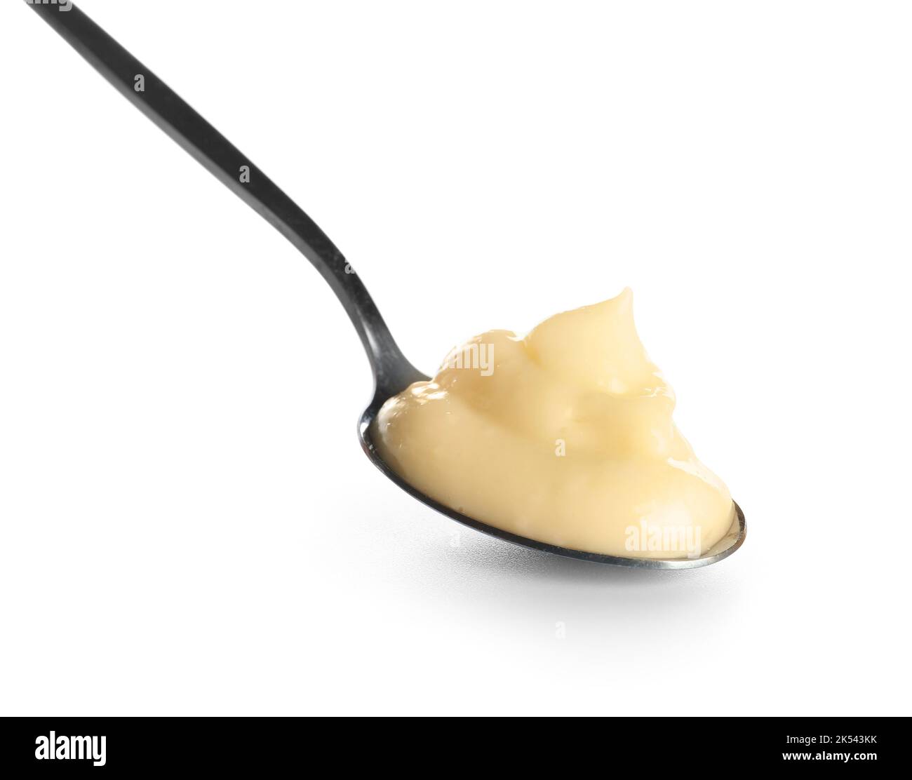 Spoon with tasty vanilla pudding on white background, closeup Stock ...