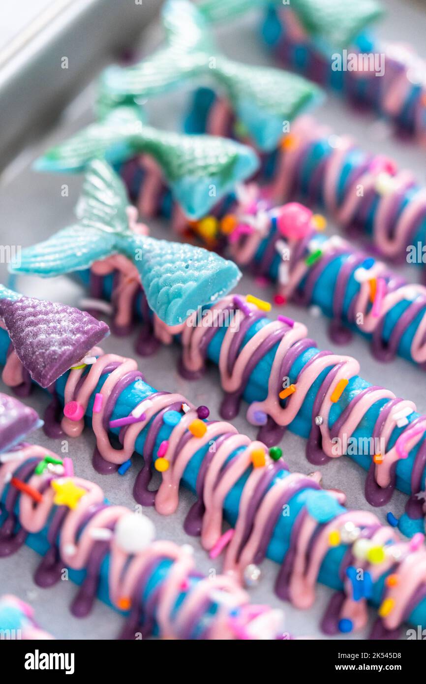 Mermaid chocolate pretzel rods Stock Photo - Alamy