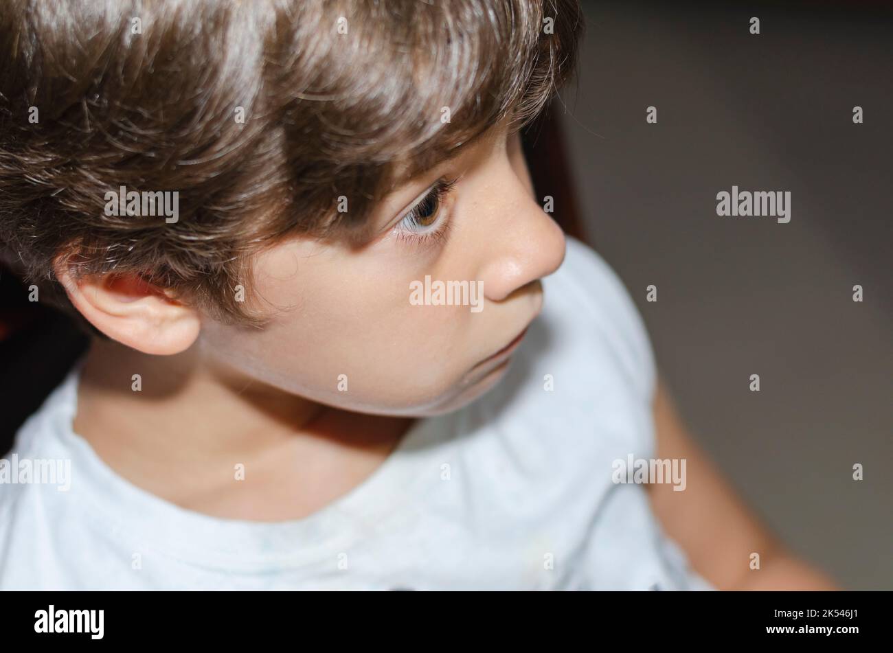 Happy little boy eating a fresh carrot and having fun. Healthy ...