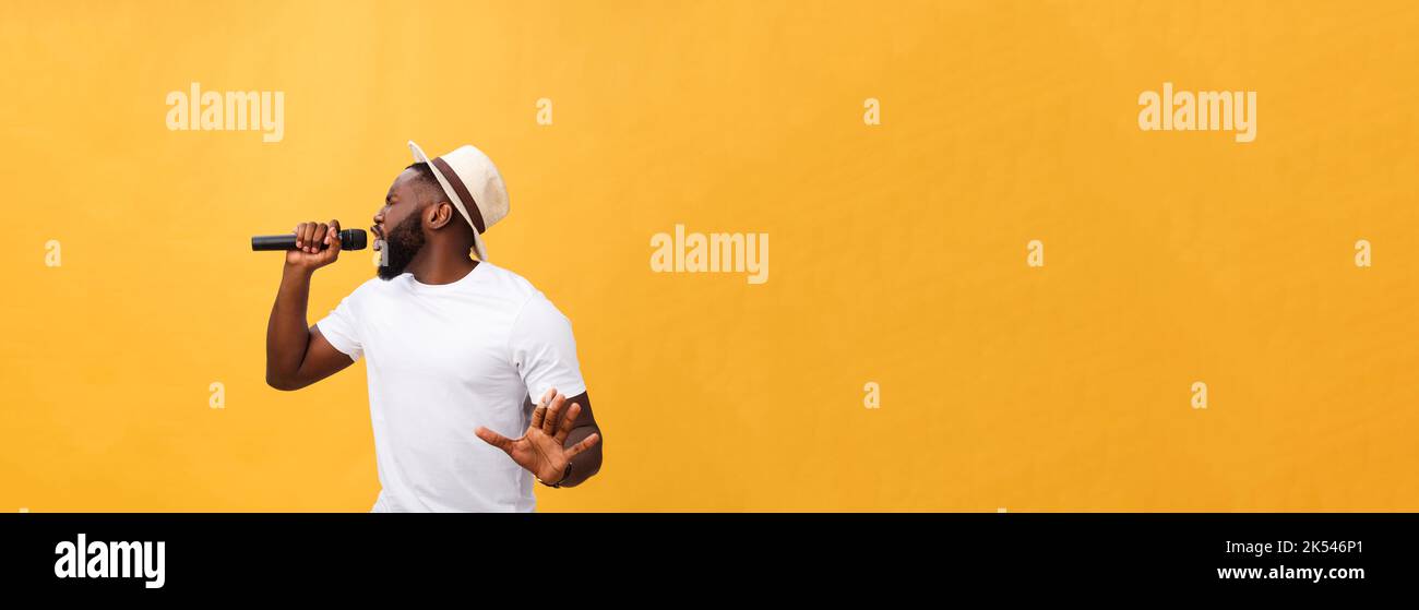 Young teenage black African American boy singer performing at a concert ...
