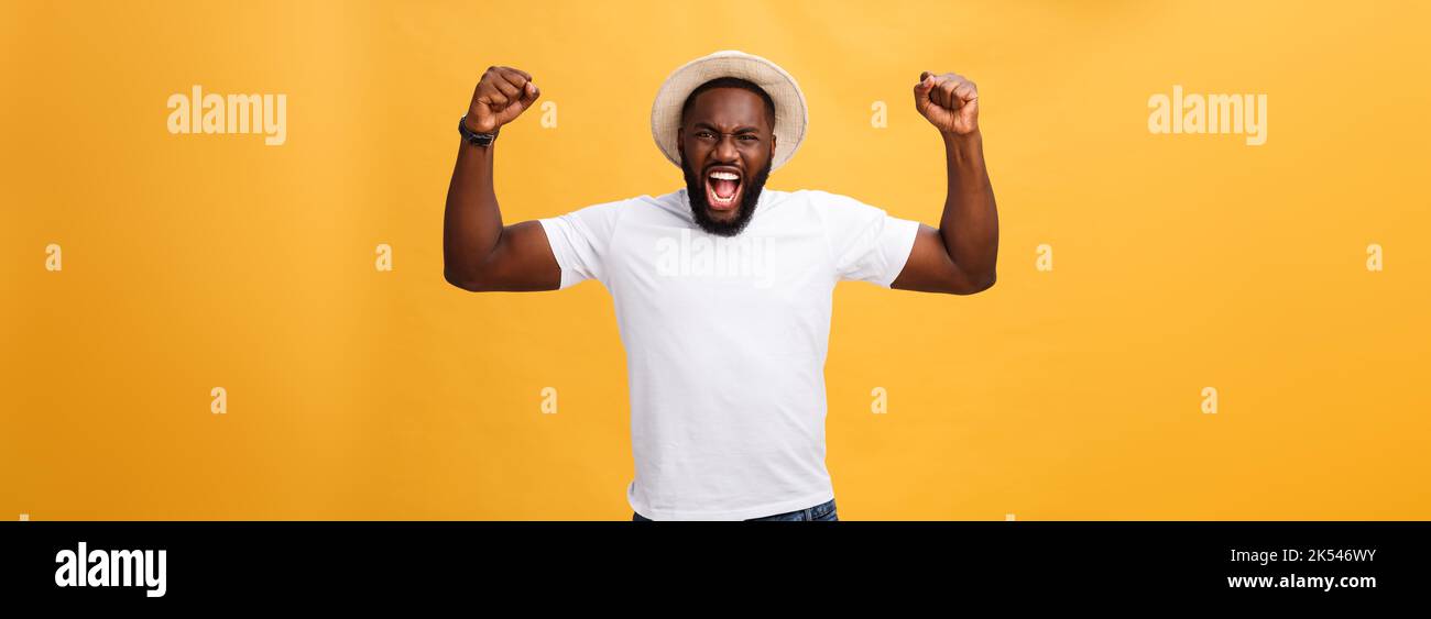 Handsome young Afro-American man employee feeling excited, gesturing ...
