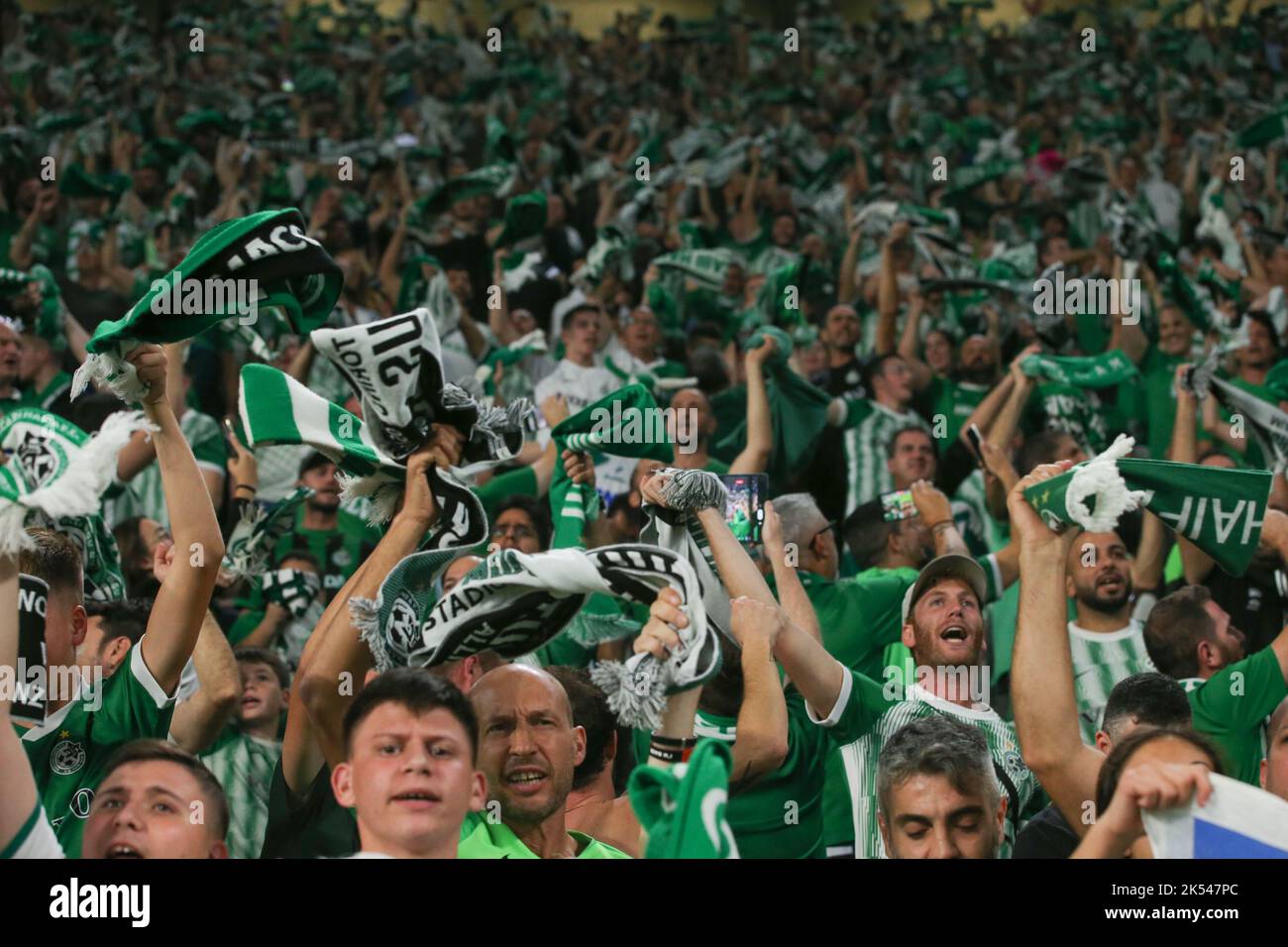 Turin, Italy, 5th October 2022. Maccabi Haifa fans wave scarves prior ...