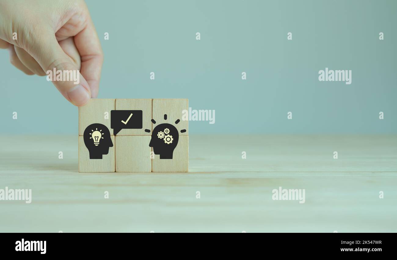 Suggestion and consulting concept. New idea, solution. Putting wooden ...