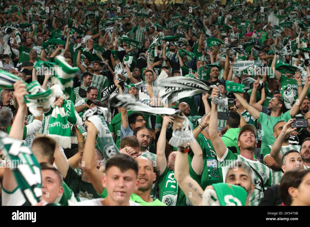 Turin, Italy, 5th October 2022. Maccabi Haifa fans wave scarves prior ...