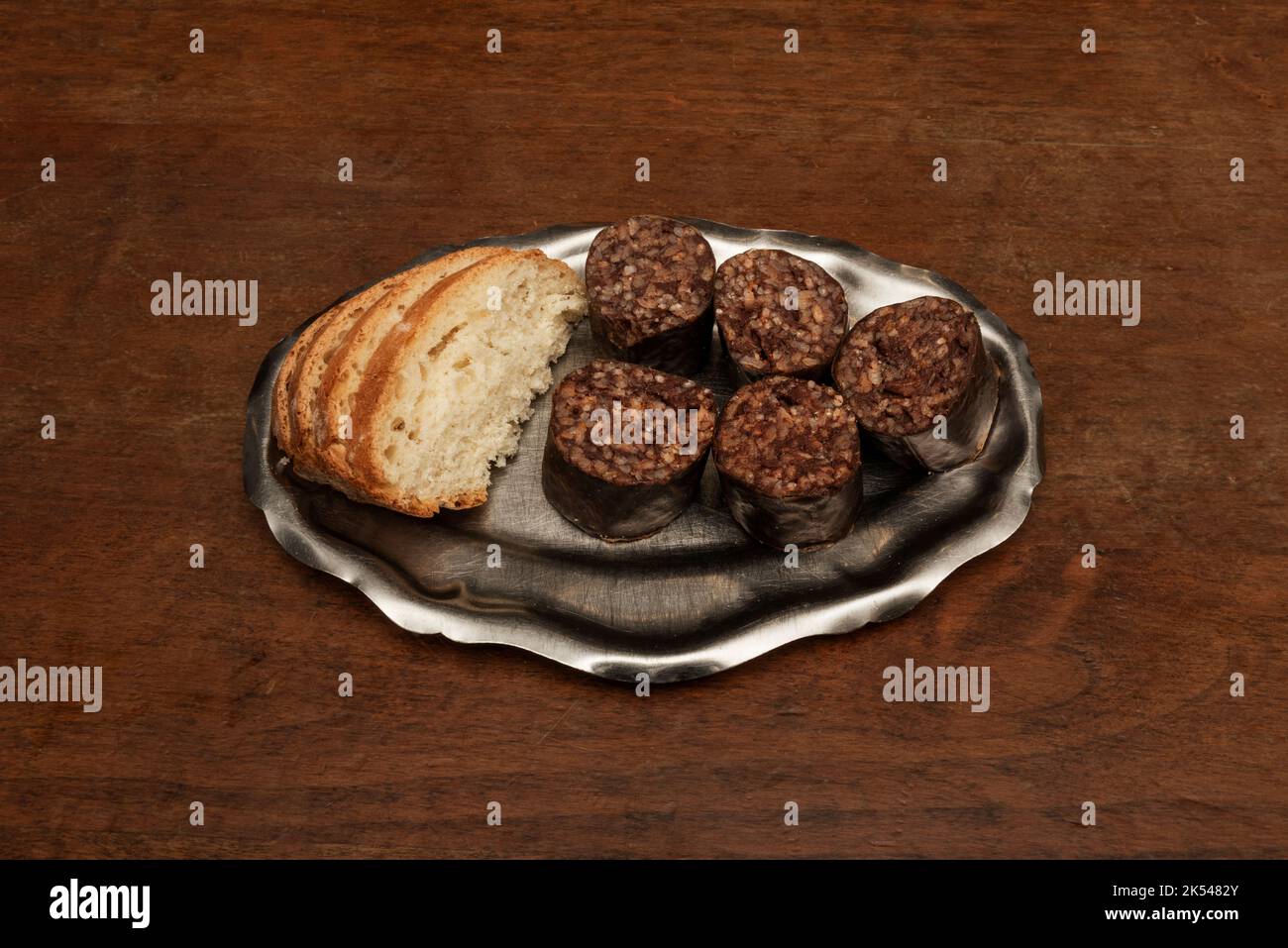 Typical hard and insane Spanish tapa of fried rice blood sausage with ...