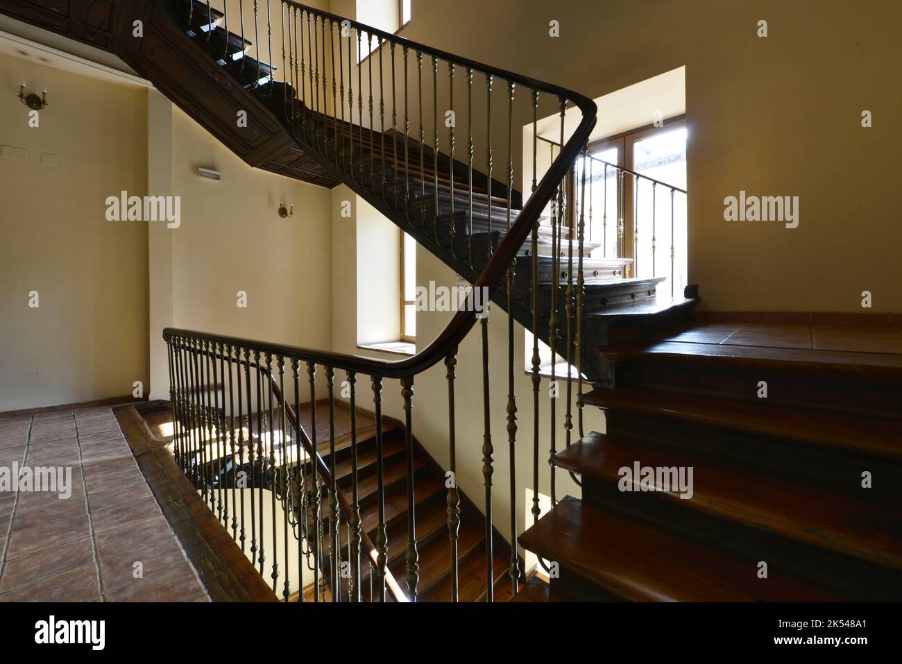 Landing on the stairs of a vintage house with solid wood steps and ...