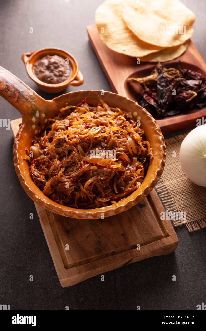 Tinga de Res. Typical Mexican dish prepared mainly with shredded beef ...