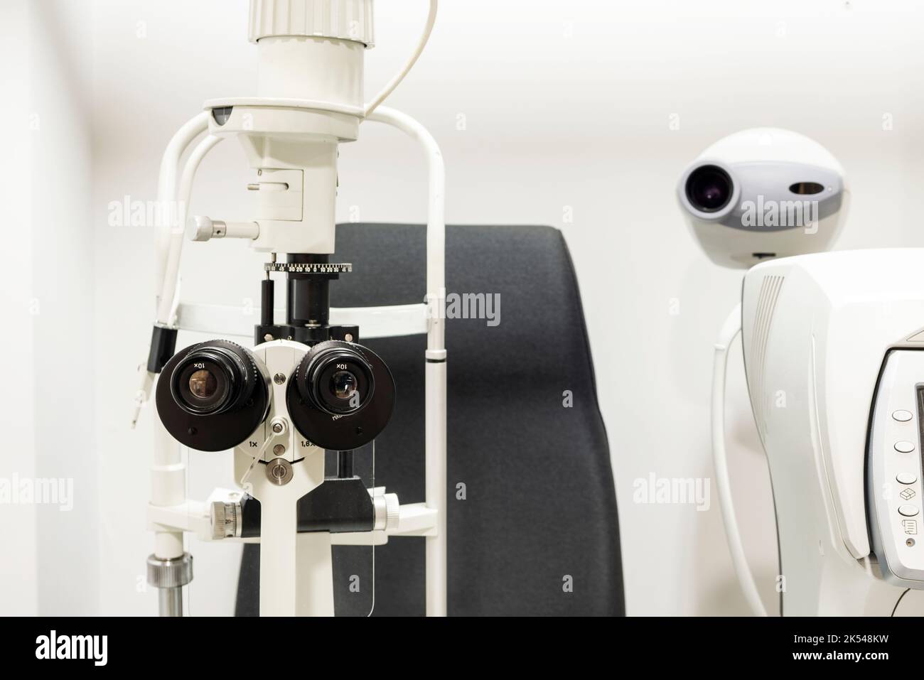 Room with optical devices to measure people's eyesight Stock Photo - Alamy