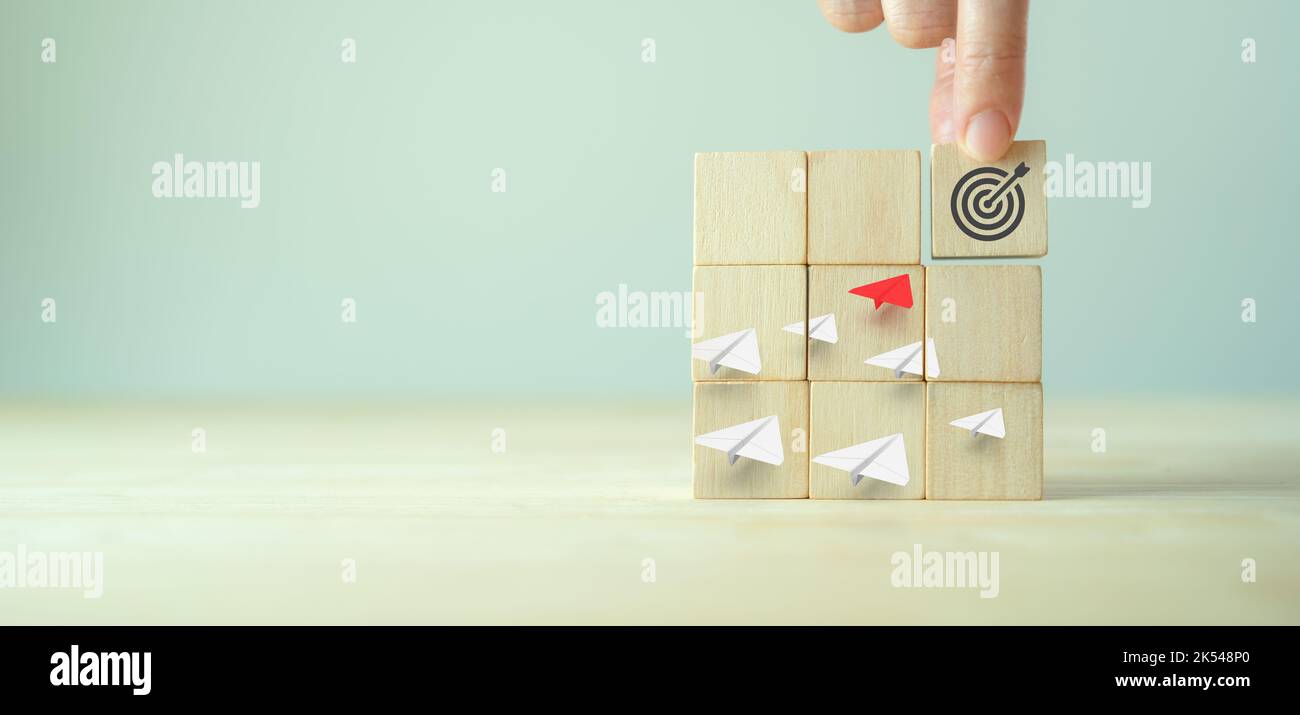 Business goals and strategies concept. Market leader. Wooden cutes with ...