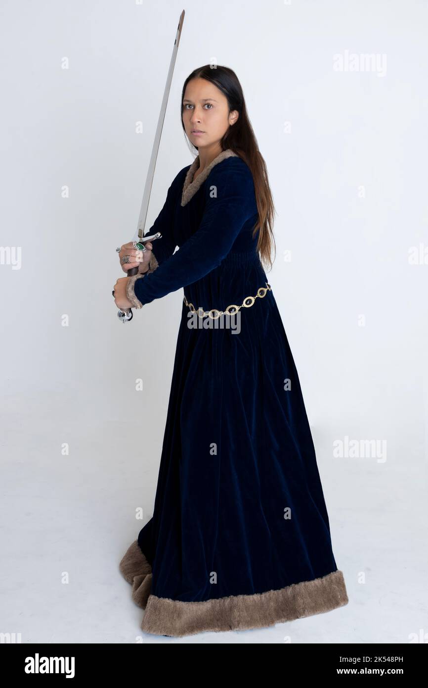 Woman holding dagger hi-res stock photography and images - Alamy