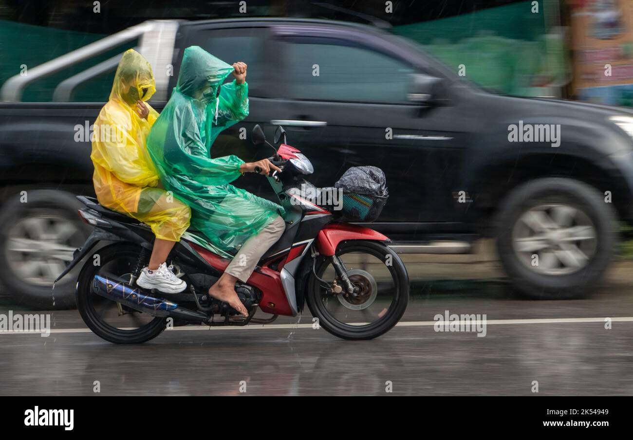 Wet raincoats hi-res stock photography and images - Alamy