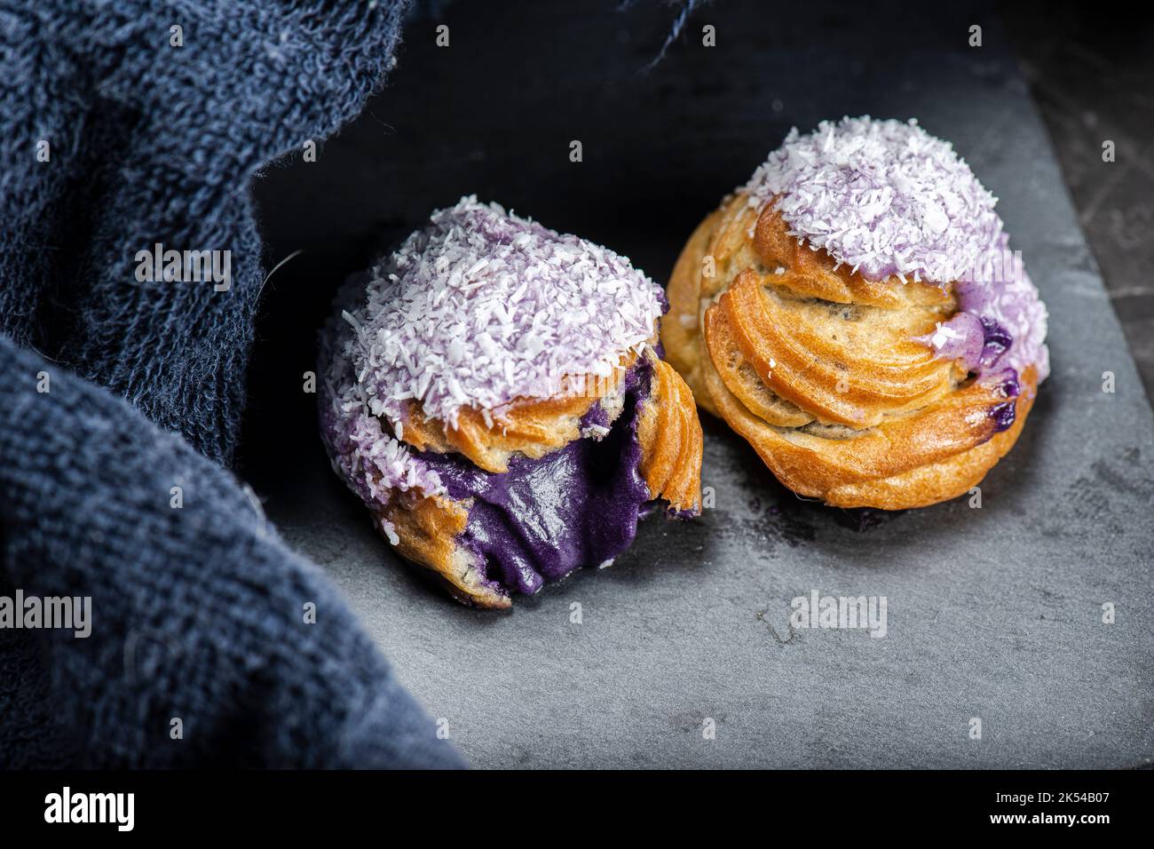 Home made ube cream puff with purple coloured white chocolate and ...