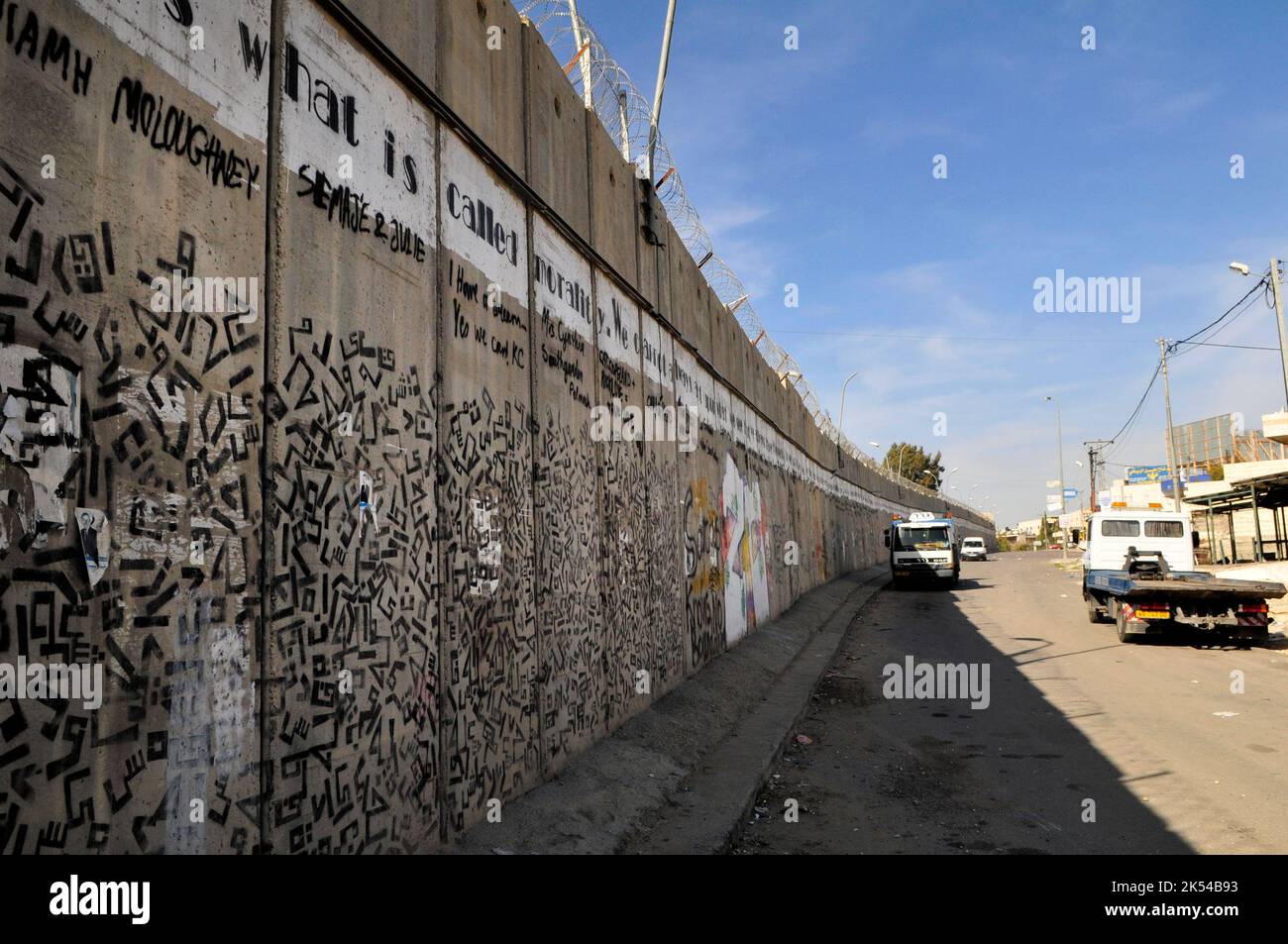 Murals on the Israeli wall barrier near the Kalandia Checkpoint between ...