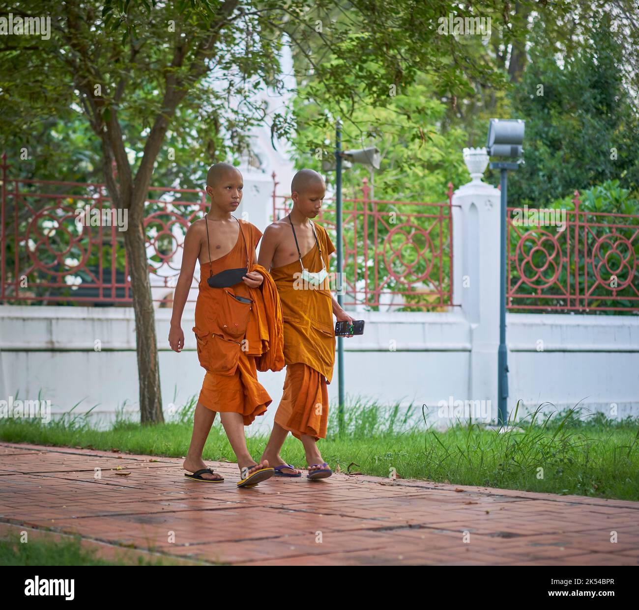 Novice monks walking hi-res stock photography and images - Alamy