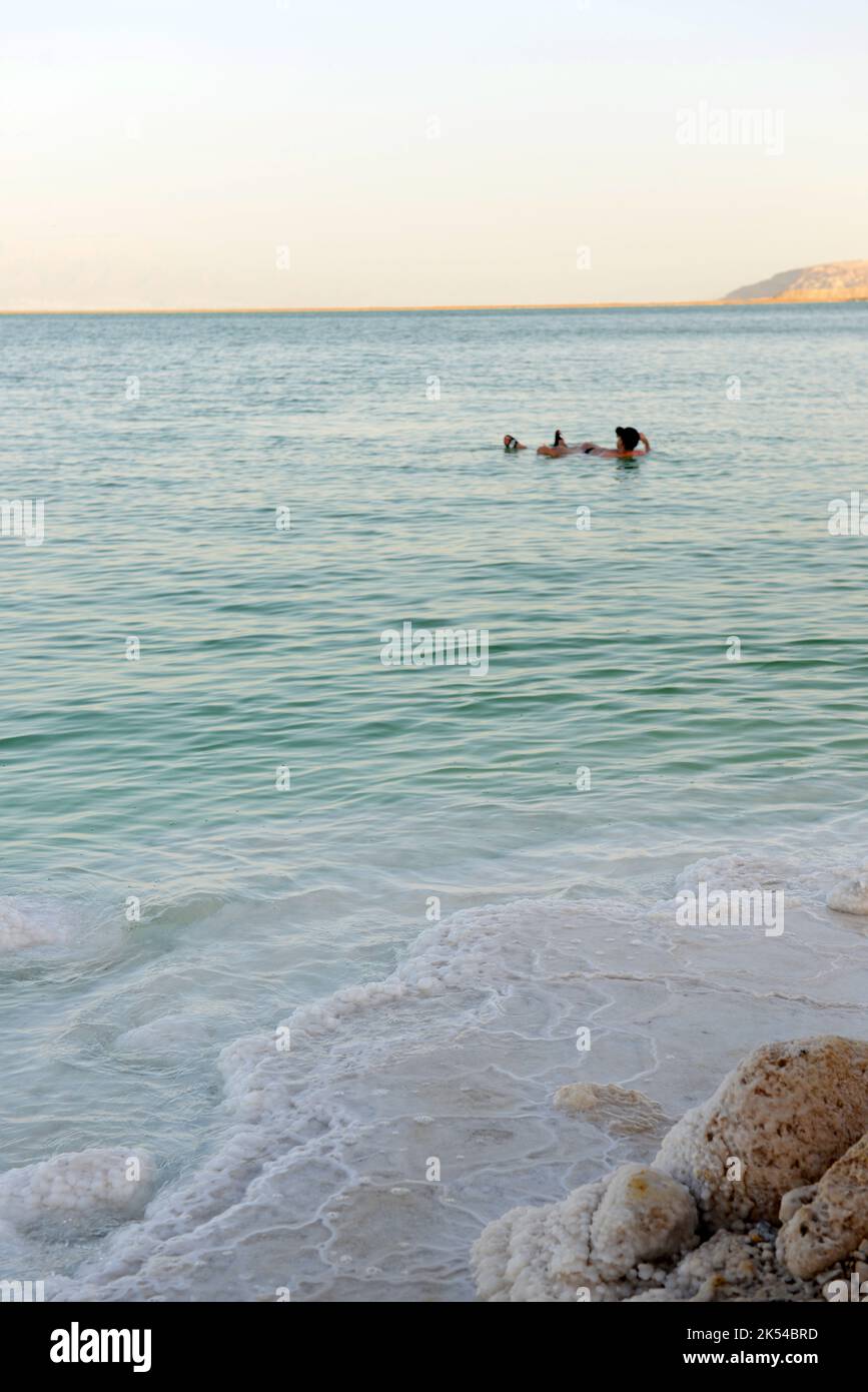 Floating and relaxing in the Dead Sea in Israel Stock Photo - Alamy