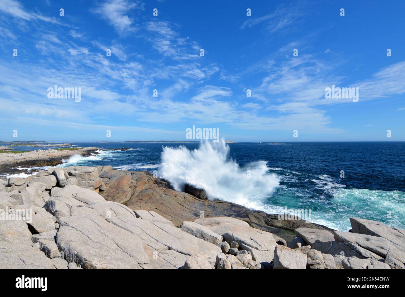 Wave breaking on a rocky coastline next to the High Head Trail ...