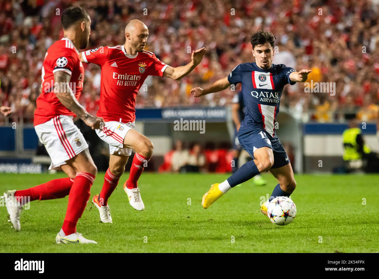 Lisbon, Portugal. 05th Oct, 2022. Vitor Machado "Vitinha" (R) of Paris Saint-Germain and Fredrik ...
