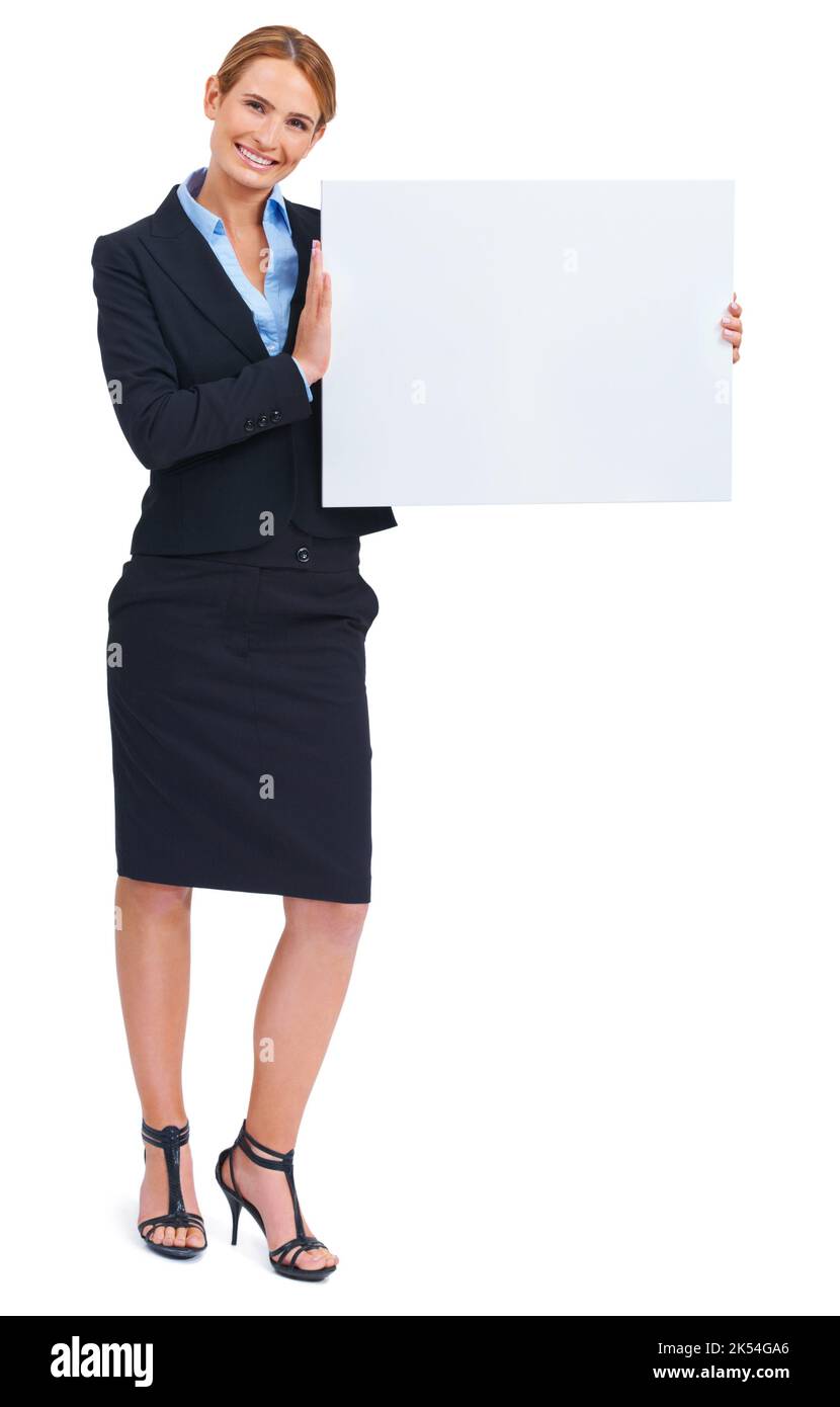 Showing your text to the word. A young businesswoman holding a placard ...