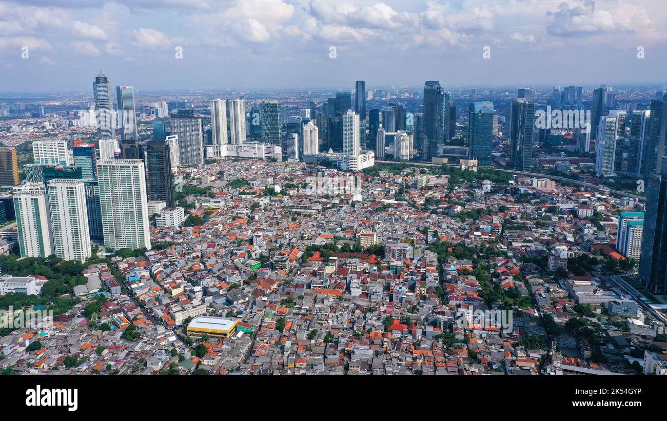 Aerial view of urban buildings at misty morning in Jakarta city ...