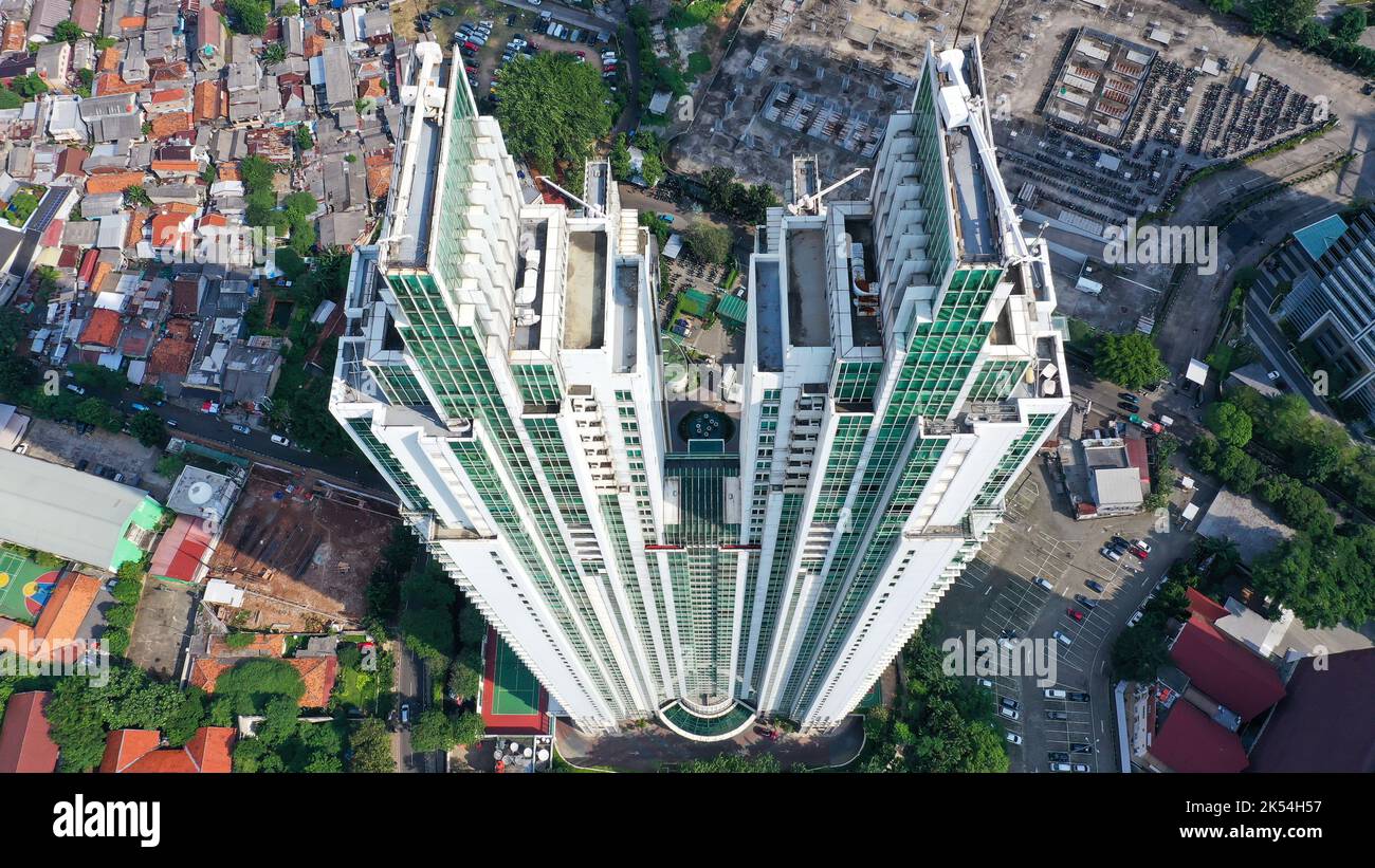 Top down view of residential apartment building in Jakarta. Birds eye ...