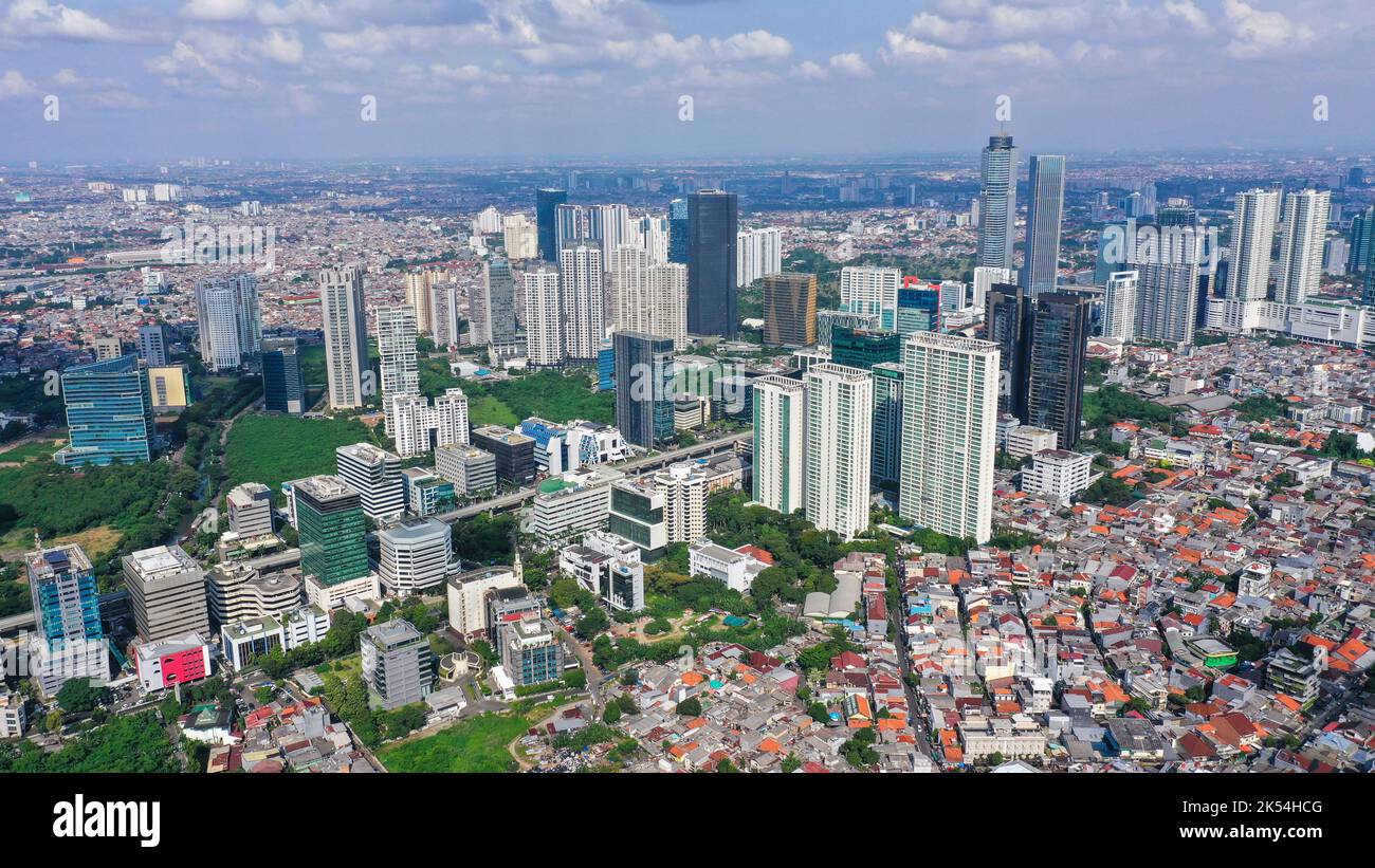Aerial view of urban buildings at misty morning in Jakarta city ...
