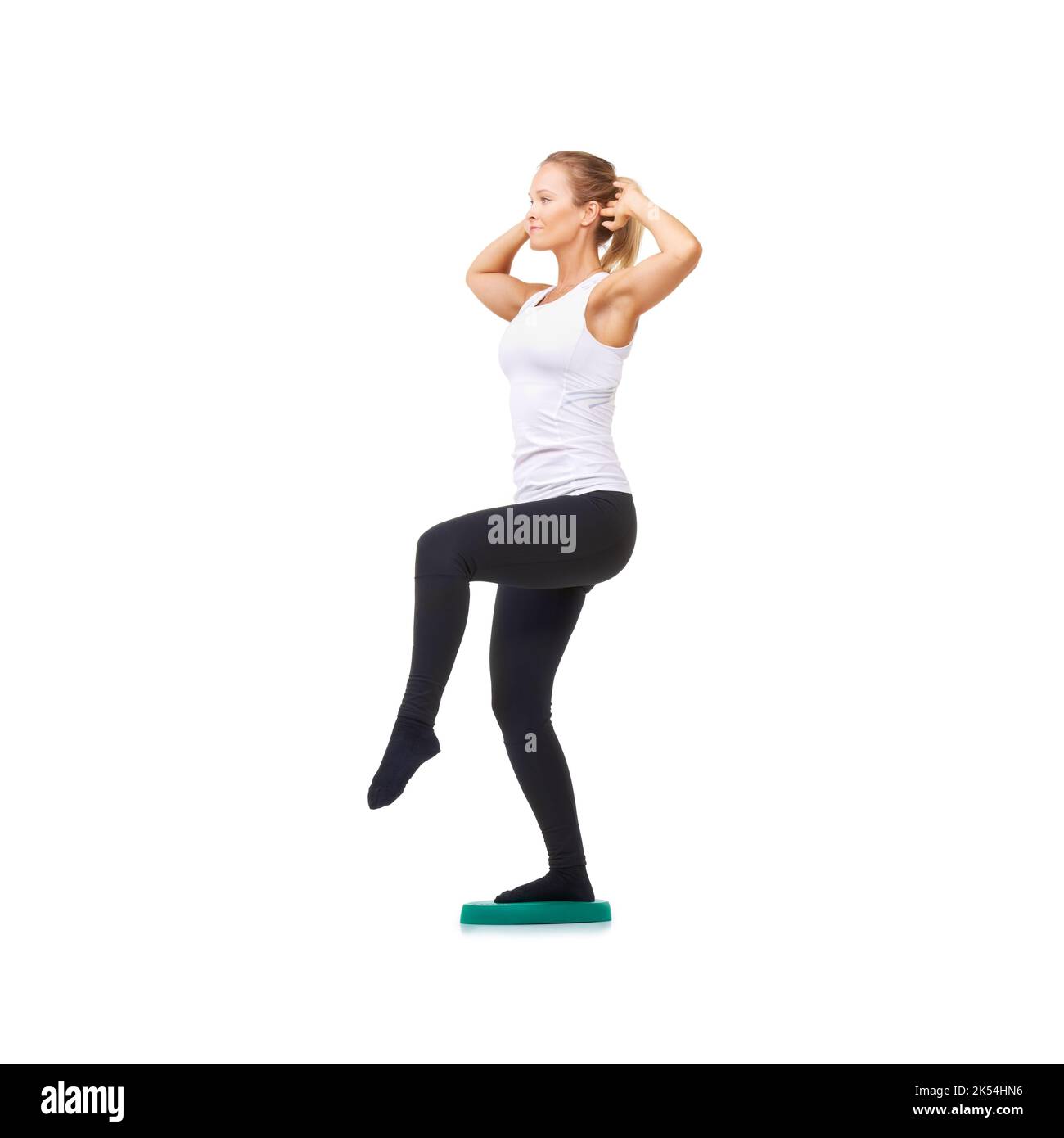 Steadiness is the key to her regime. Full length studio shot of an ...