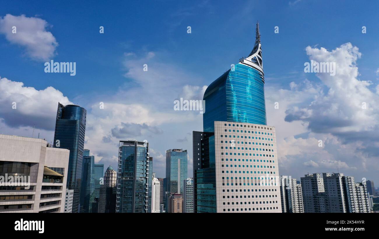 Modern corporate buildings against blue sky. High-rise buildings in ...