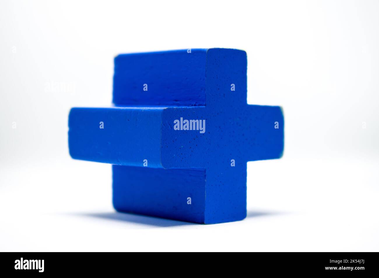 Cross geometry Made of wood laid on a white background Stock Photo - Alamy