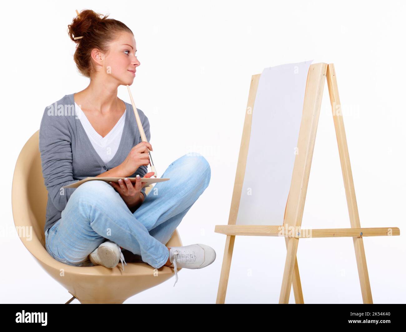 Waiting for inspiration to strike. Studio shot of a young female artist ...