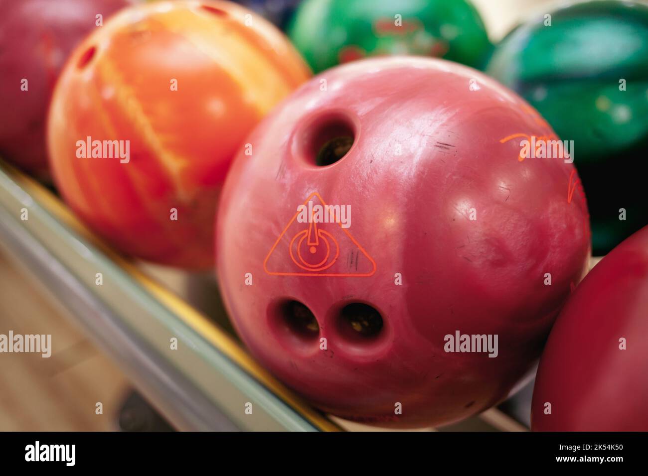 Bowling balls close-up. Paths with balls and pins for bowling. A fun ...
