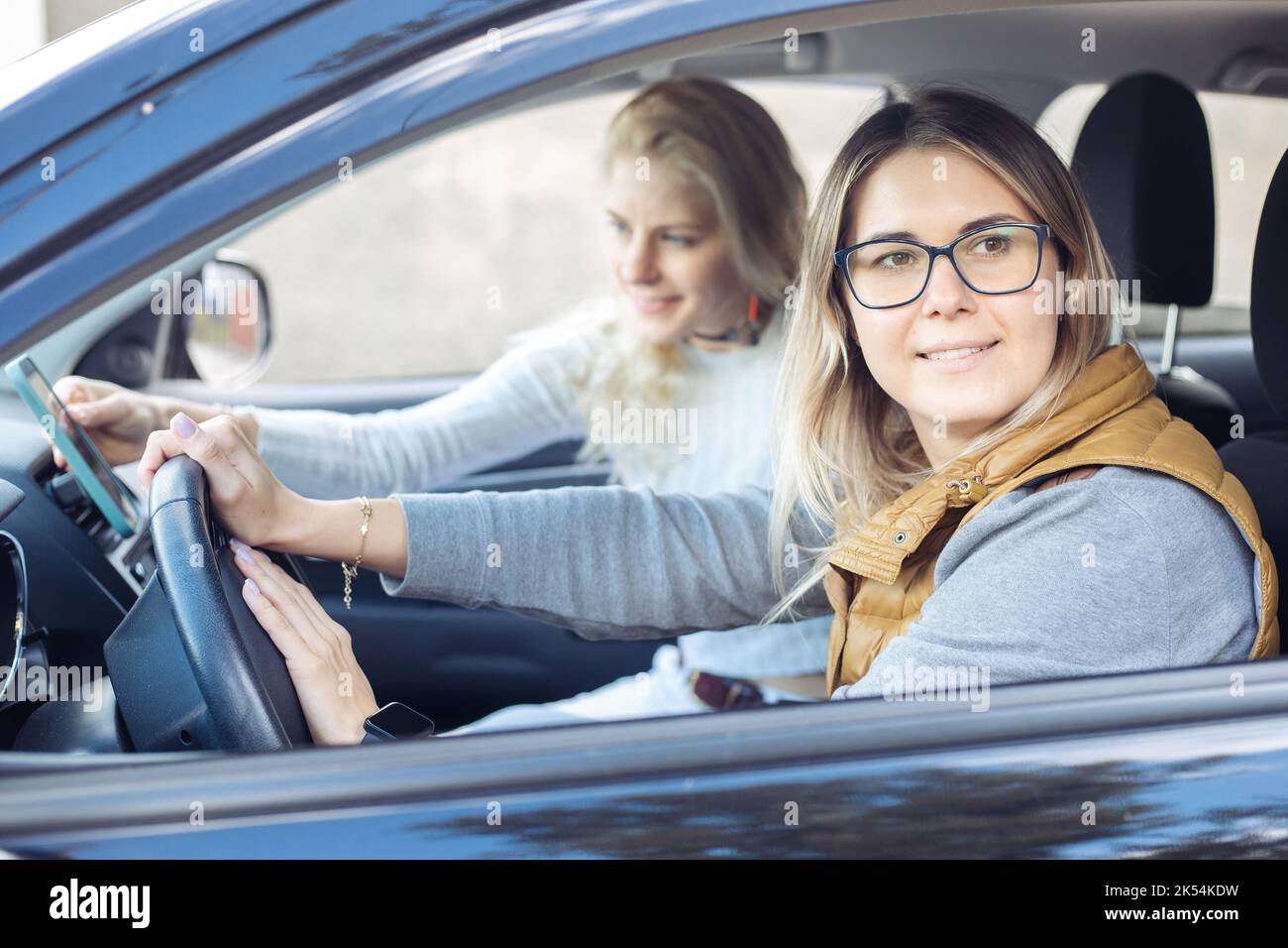 Two friends enjoy carefree drive hi-res stock photography and images ...