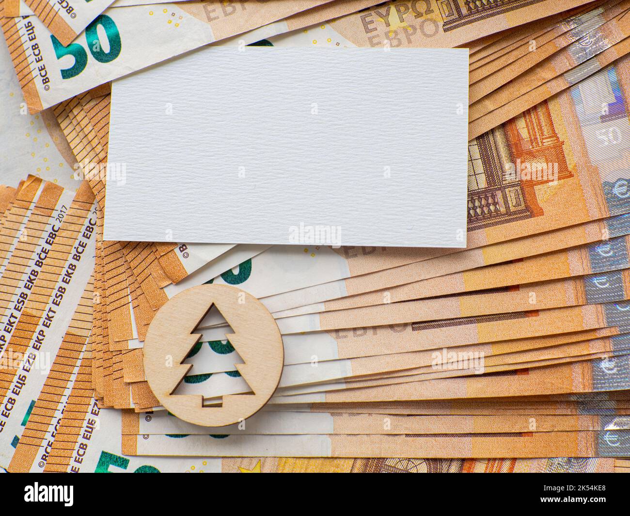 Copy space with christmas tree on the background of fifty euros ...