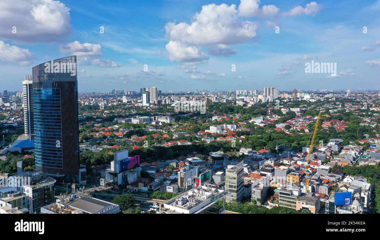 Aerial view of urban buildings at misty morning in Jakarta city ...