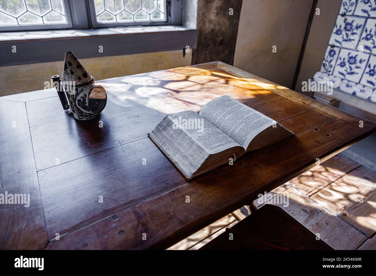 An interior of Monk house with book table in Ittingen Charterhouse ...