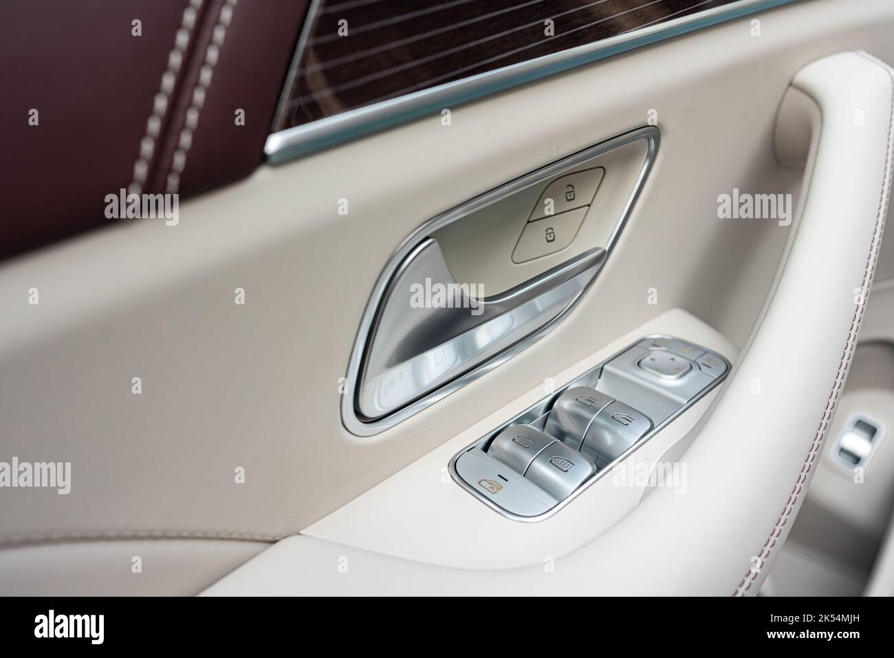 Front handle door panel with buttons of a luxury car Stock Photo - Alamy