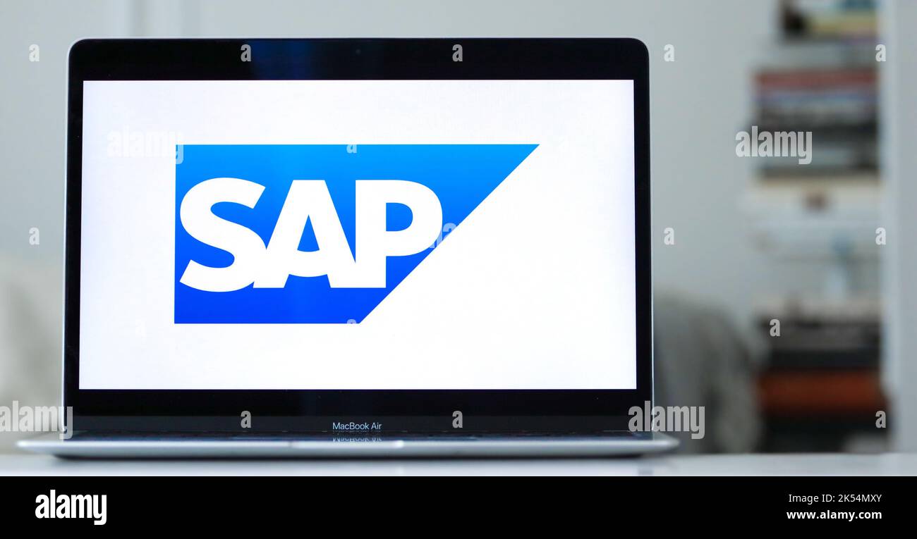A logo design of SAP on a laptop screen in blurred background Stock ...