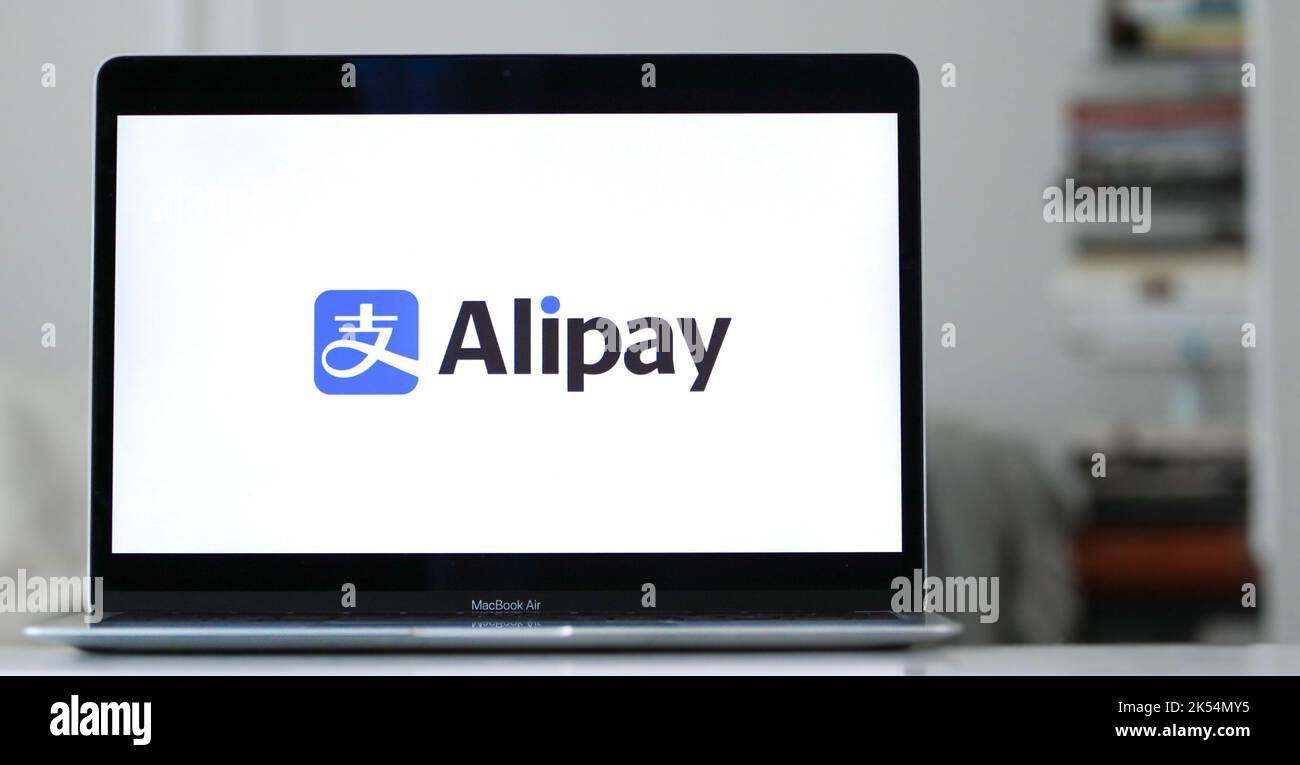 A logo design of alipay on a laptop screen in blurred background Stock ...