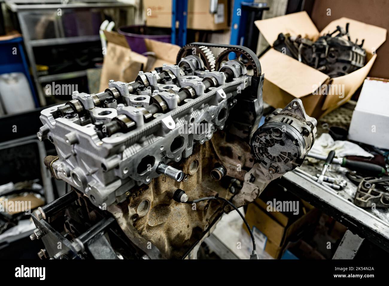Disassembled car engine block at car service station Stock Photo - Alamy