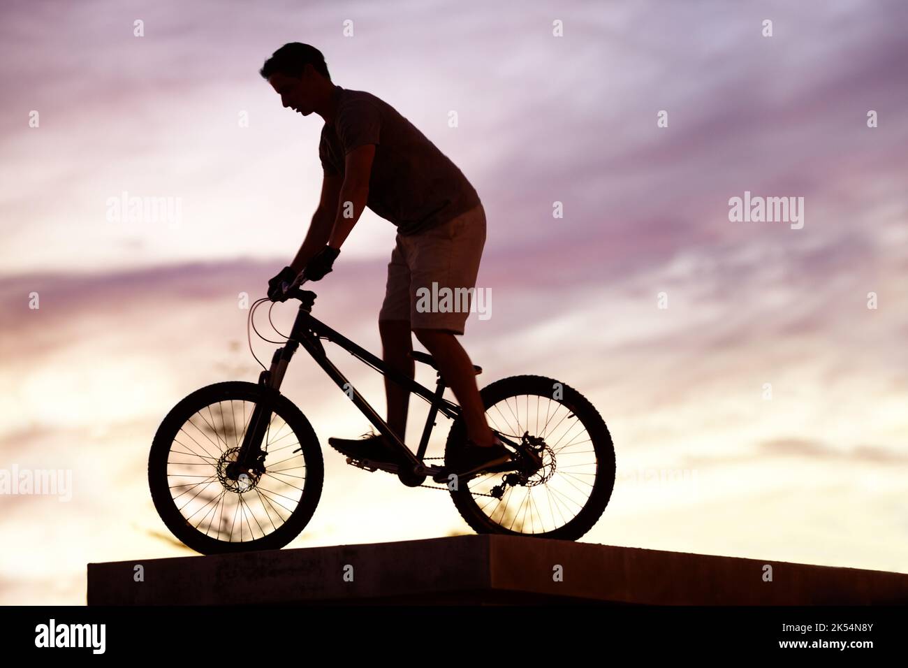 Teenager riding a bike hi-res stock photography and images - Alamy