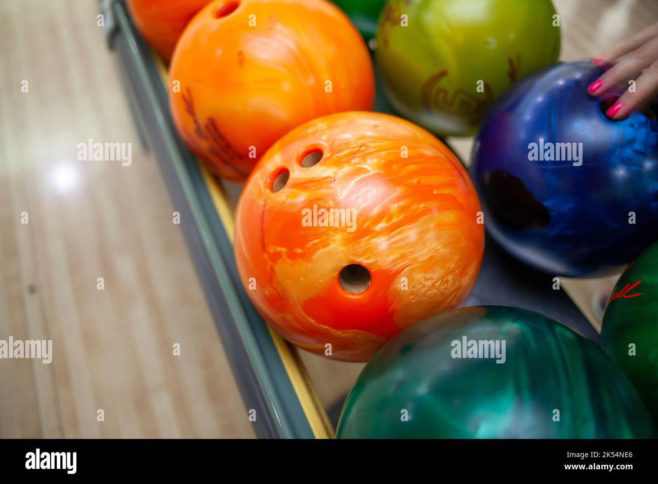 Bowling balls close-up. Paths with balls and pins for bowling. A fun ...