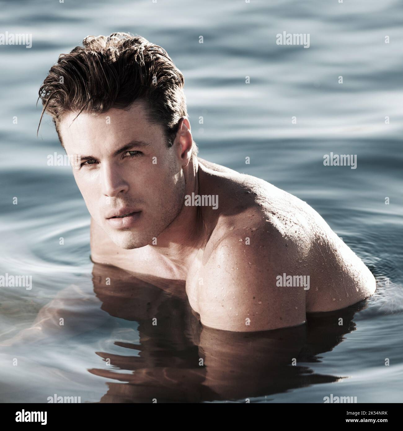 Swimming handsome muscular fit male hi-res stock photography and images ...