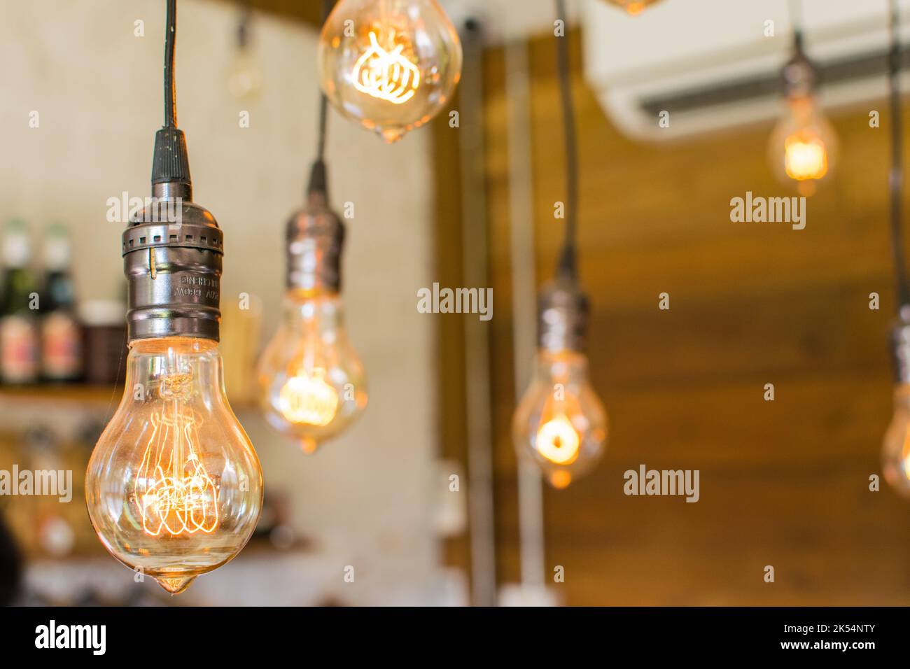 Orange lights used in the coffee shop. celebration Light bulb Stock ...