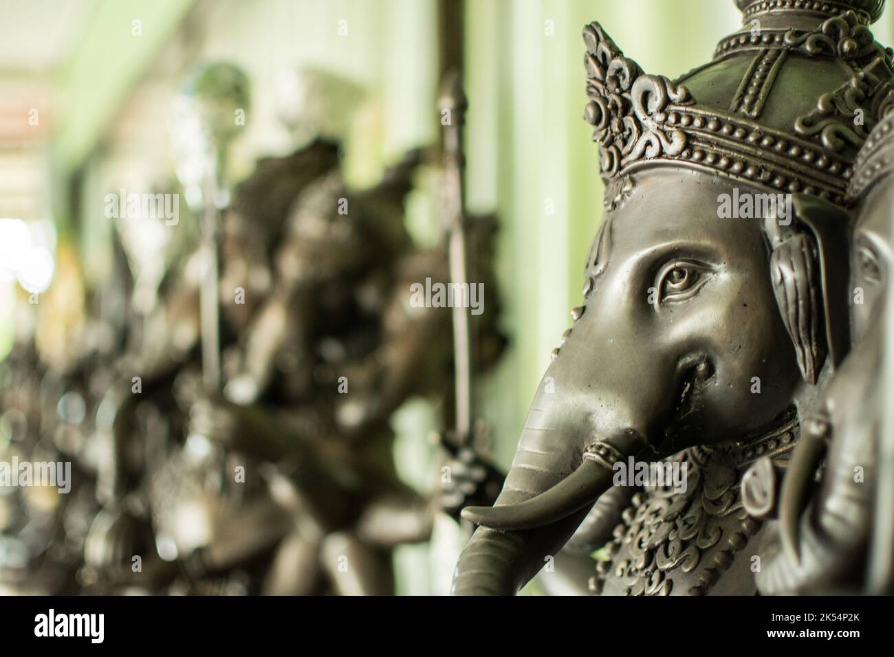 Close up black Ganesha statue and gray texture ganesh is hindu god of ...