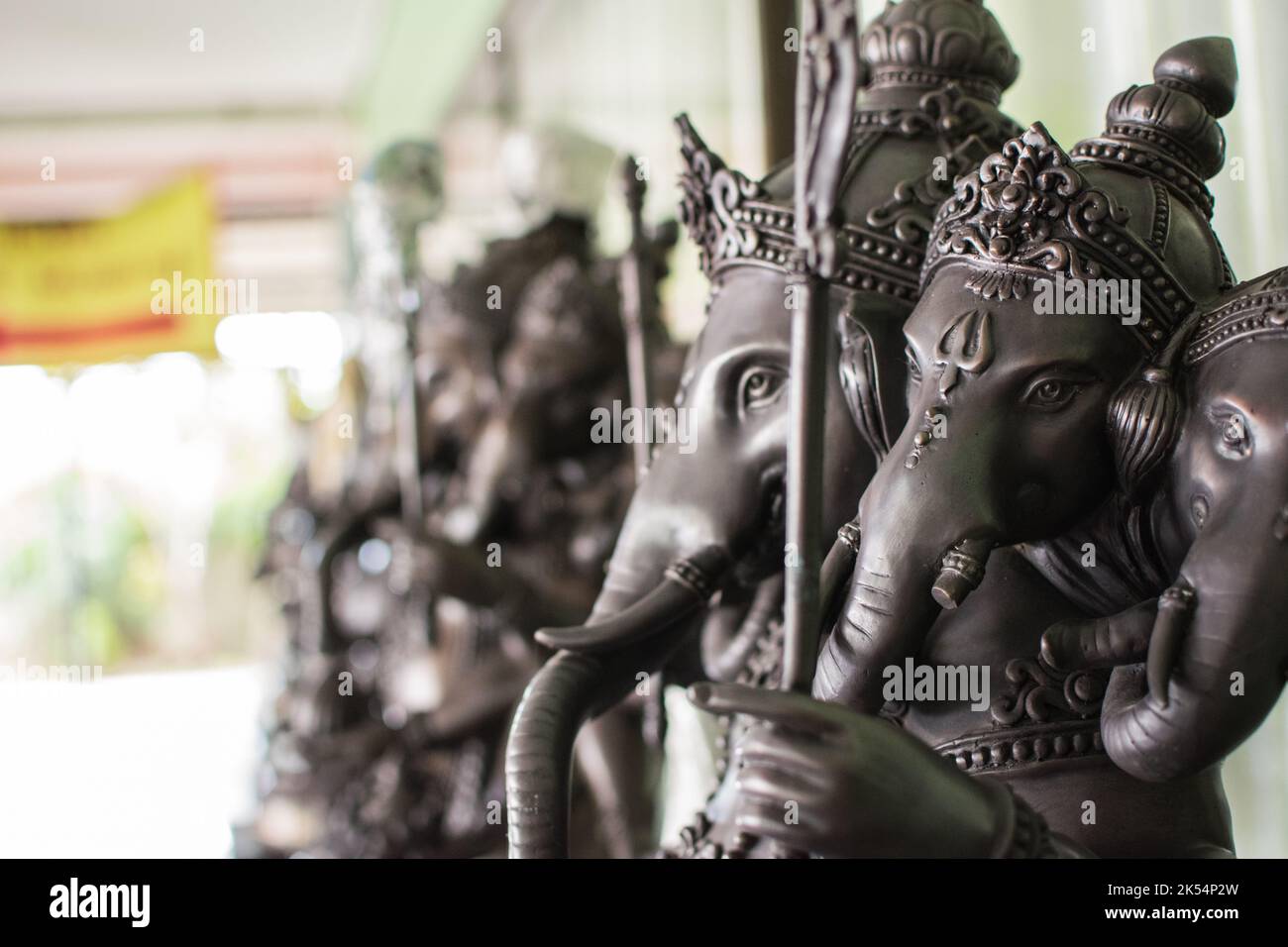 Close up black Ganesha statue and gray texture ganesh is hindu god of ...